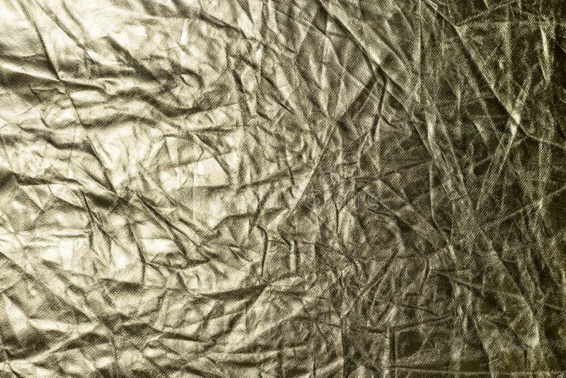 Golden Crumpled Foil Paper Texture Background. Stock Photo - Image of ...
