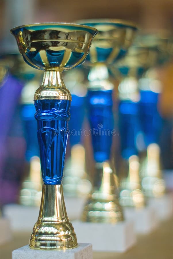 Cups for awarding winners stock image. Image of championship - 92348819