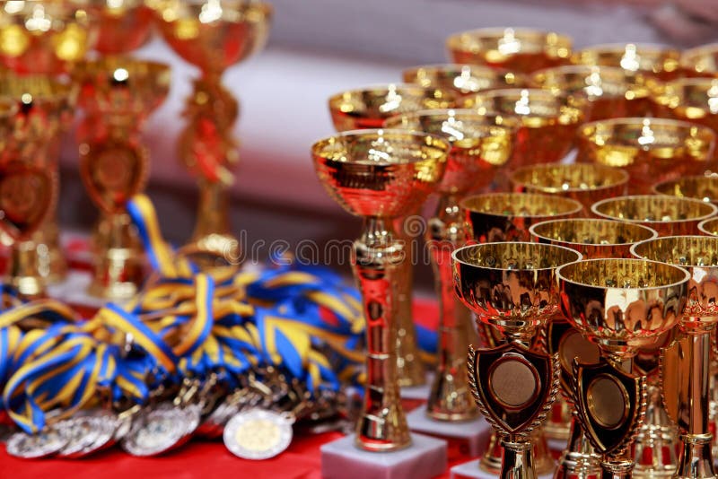 Golden cups for awarding stock photo. Image of prize - 97586540