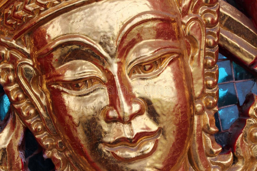 Golden Deva face stock photo. Image of decoration, creed - 22061312