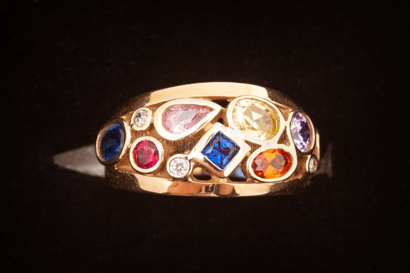 Golden Diamond Ring. Beautiful Ring with Different Color Gemstones ...