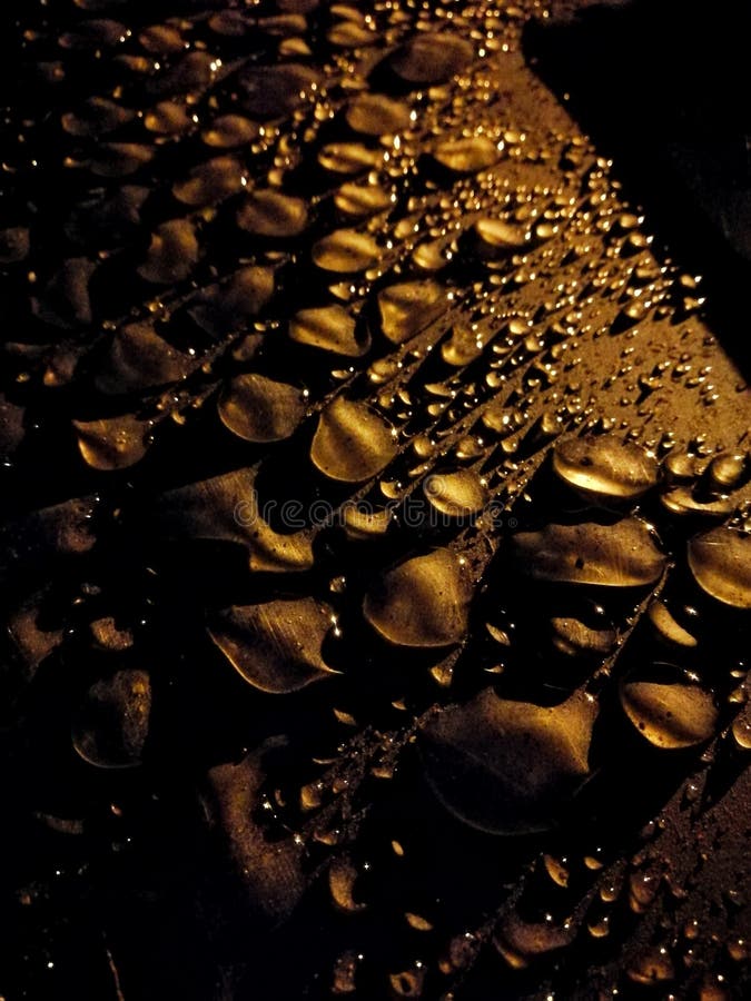Golden drop stock image. Image of rain, night, temple - 99728515