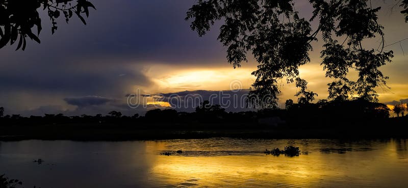 A Golden Dusk on River Site Stock Image - Image of sunset, lake: 189896909
