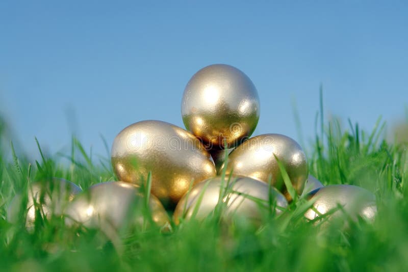 Golden egg pyramid stock photo. Image of field, shell - 4995986