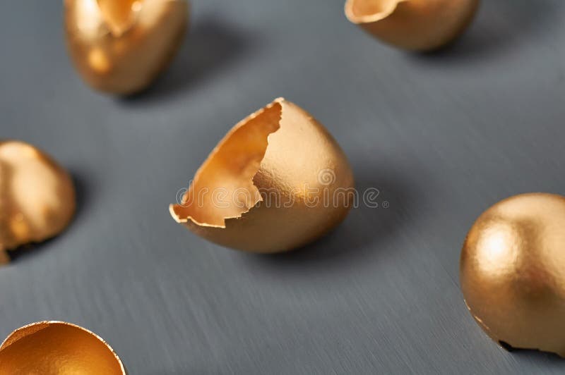 Golden Egg Shells on Dark Concrete Background. Concept of Easter Stock ...