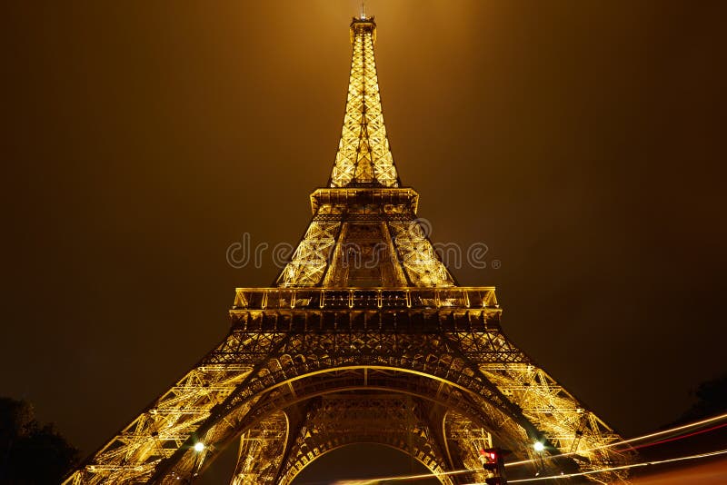 Golden Eiffel Tower in Paris at Night Editorial Photo - Image of ...