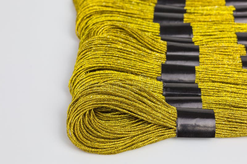 Golden embroidery thread stock photo. Image of hobby - 176447504