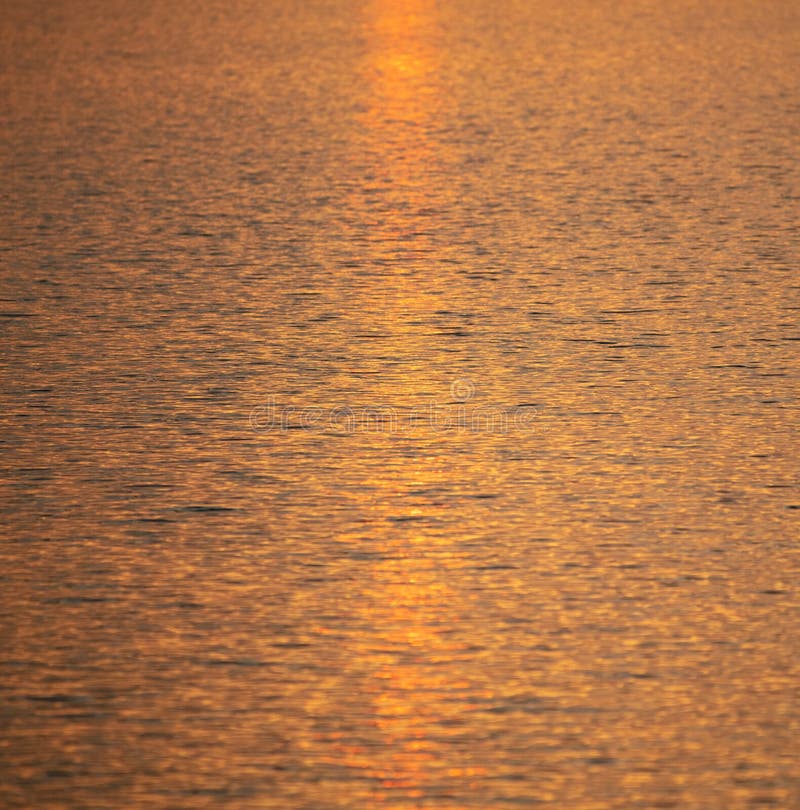 Golden Expanse of Water at Sunset. Stock Image - Image of light ...
