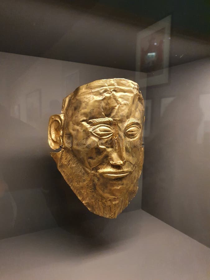 Golden face mask ancient stock image. Image of lighting - 234729307