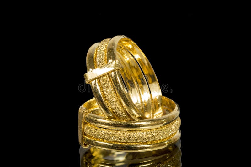 Golden fancy rings stock photo. Image of fashion, beauty - 49197394