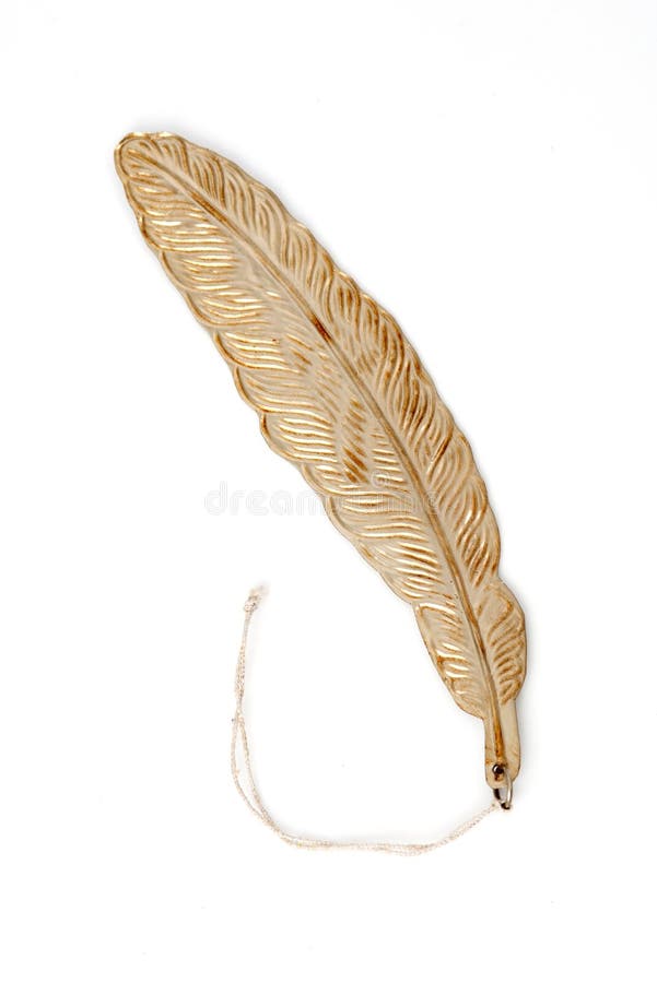 Golden Feather-shaped Ornament with String, Isolated on White ...