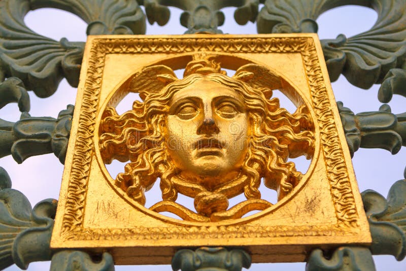 Golden figure of the sun stock image. Image of carved - 265477245