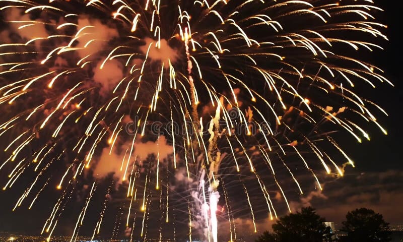 Golden Fireworks Cascading into Bright Shimmering Trails and Radiant ...