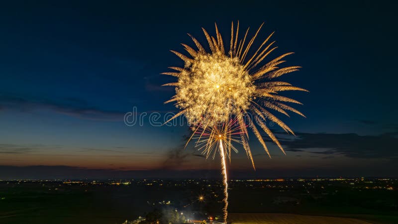 Golden Fireworks Exploding in the Night Sky, Forming a Large, Radiant ...