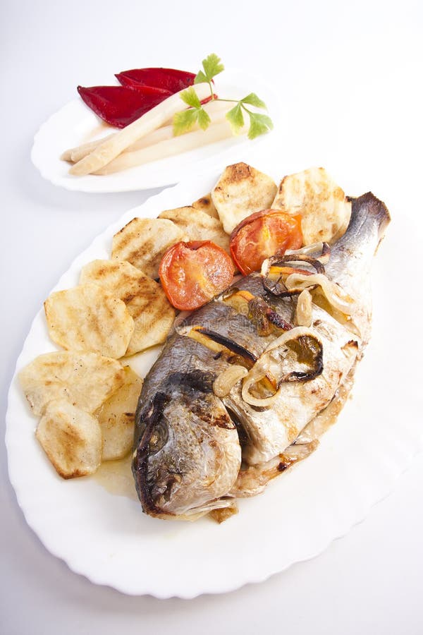 Golden fish stock image. Image of gourmet, catch, plate - 24502019