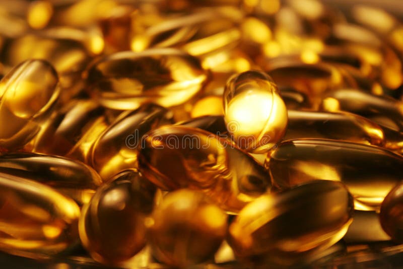 Golden Fish Oil Capsules stock image. Image of golden, health - 201713