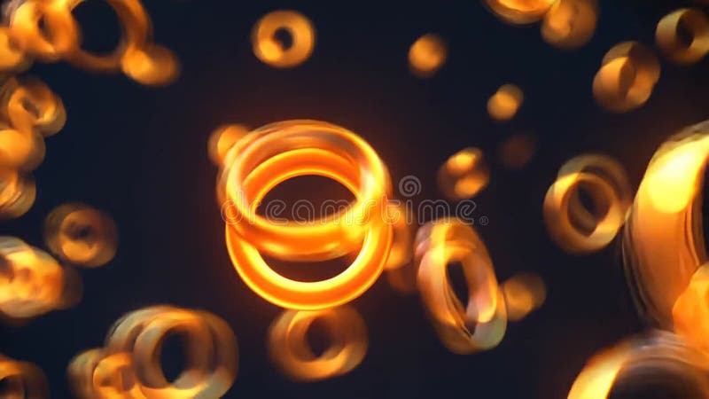Golden Floating Rings Against a Dark Background Showcasing a Smooth ...
