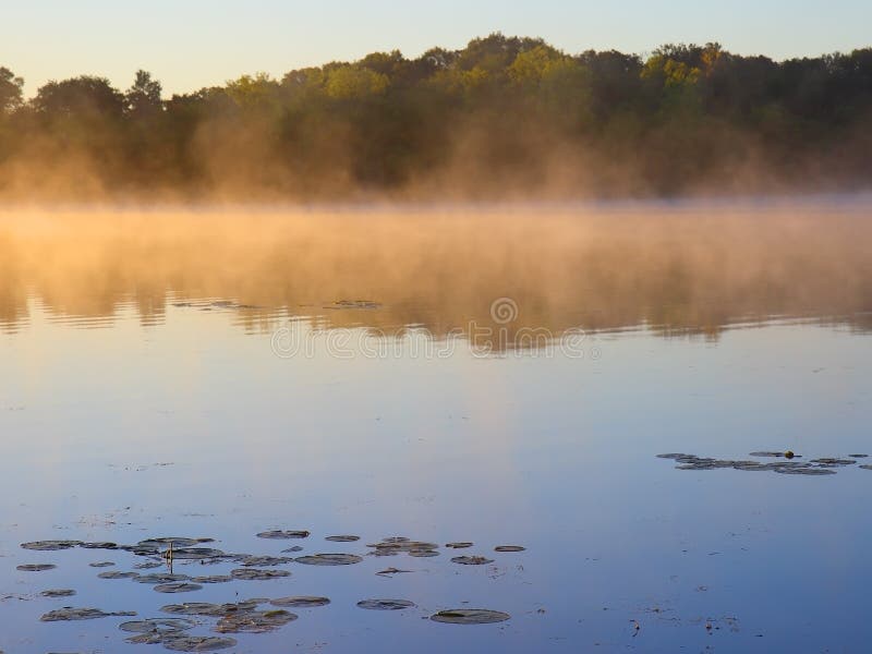 Sunrise on the lake stock image. Image of minnesota, water - 3454121