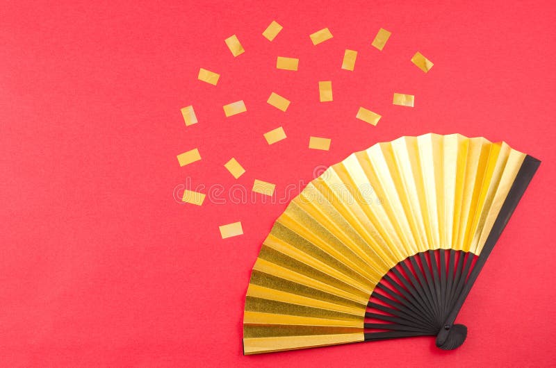 Golden Folding Fan and Confetti Stock Photo - Image of folding, goods ...