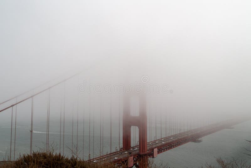 Golden Gate Bridge in fog stock image. Image of cliff - 191925331