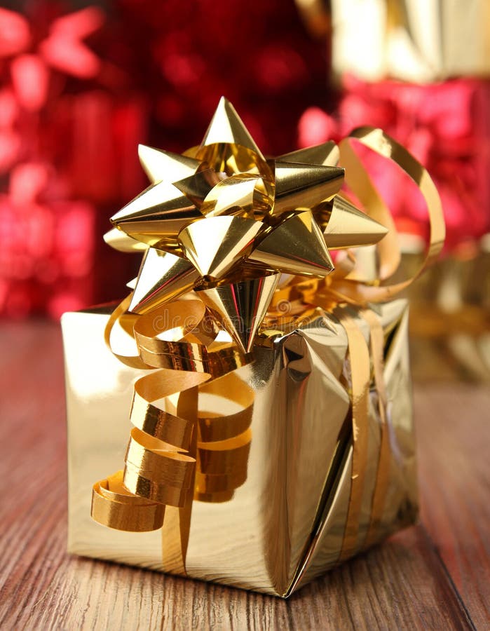 Golden gift box stock photo. Image of festive, present - 21686452