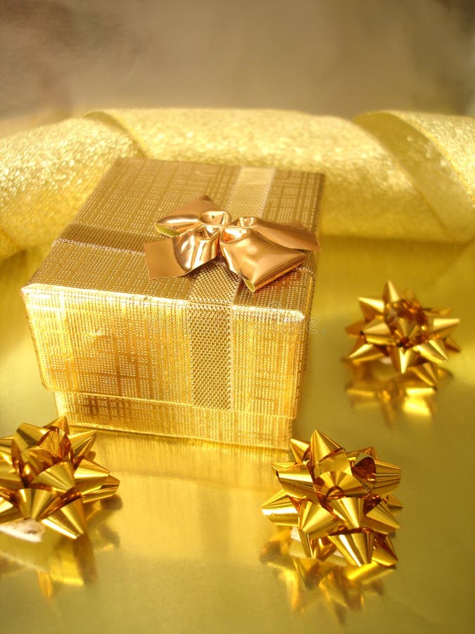 Beautiful Gift Box in Gold Wrapping Paper Stock Photo - Image of ...