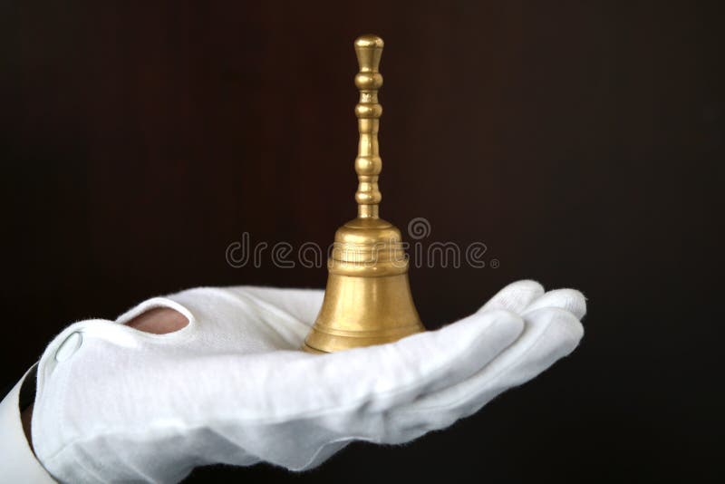 Golden Hand bell stock photo. Image of valet, hand, butler - 72555730