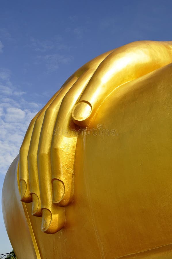 Golden hand of Buddha stock photo. Image of religious - 77891766