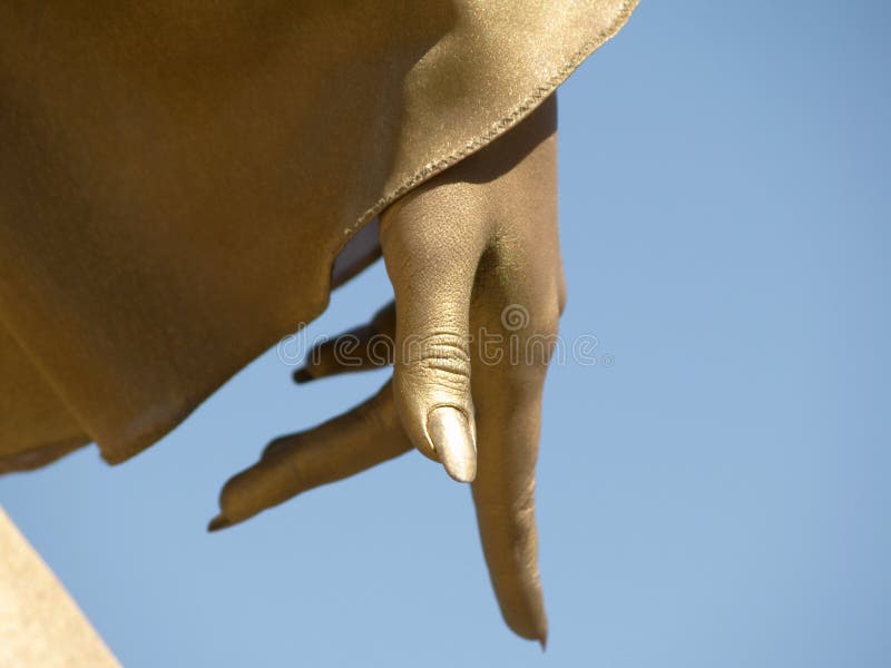 Golden hand pointing down stock photo. Image of downstairs - 3229006