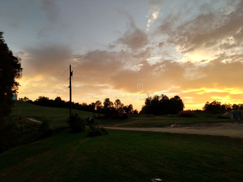 Golden hour on an old farm stock image. Image of golden - 199223937