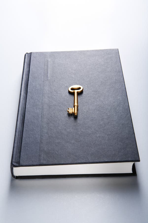 Golden key on book stock image. Image of encyclopedia - 7293599