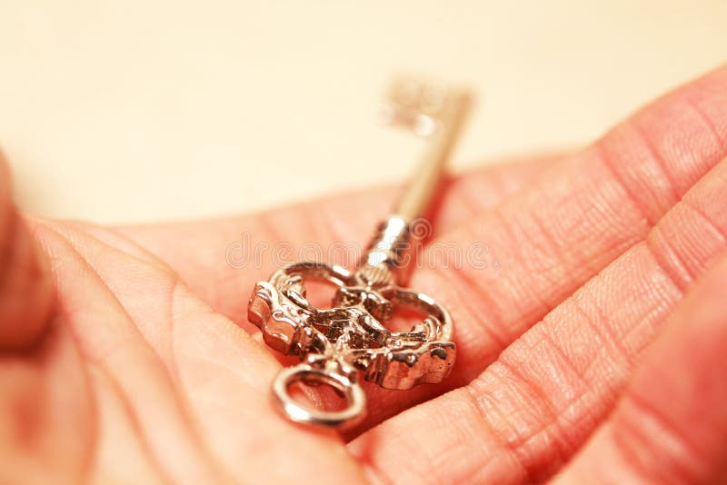 Golden key in hand stock image. Image of latchkey, opportunity - 7874675