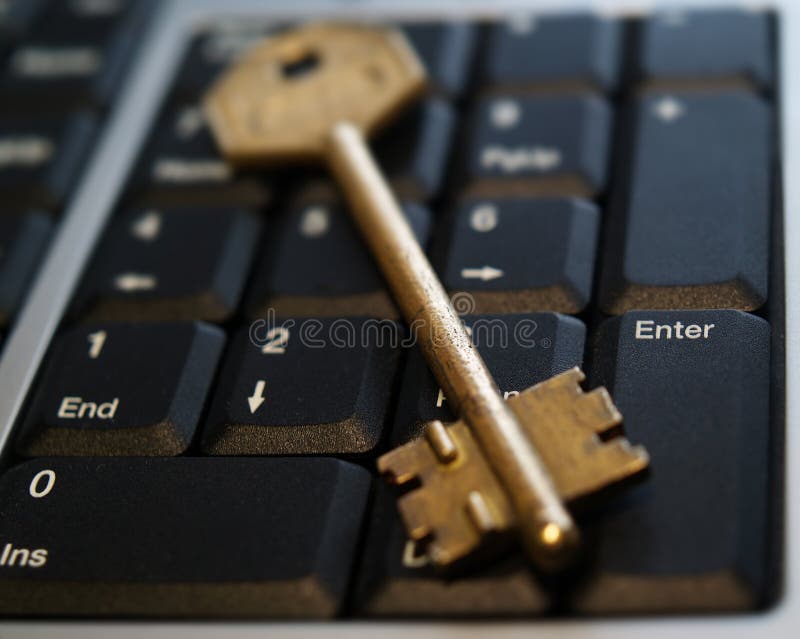 Golden key on laptop4 stock photo. Image of close, safety - 1602608