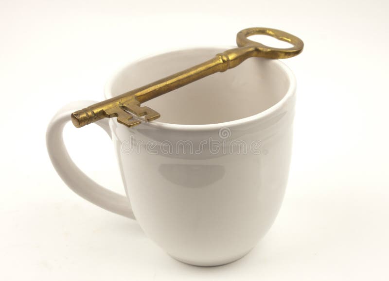 Golden Key Over a White Cup Stock Photo - Image of antique, drink: 24190626