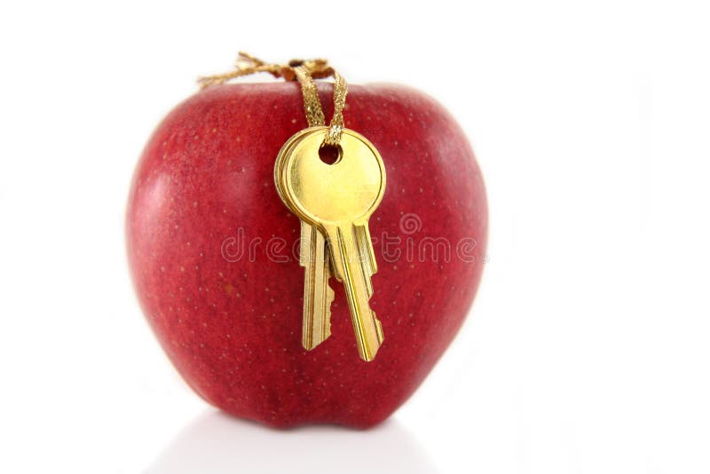 Golden key and red apple stock image. Image of fortune - 596239