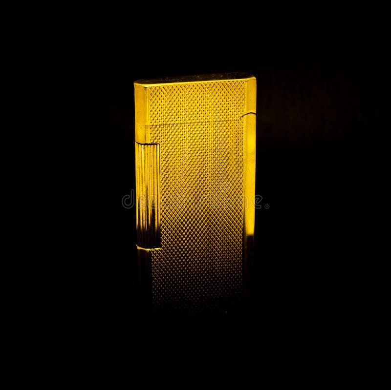 Golden Lighter stock image. Image of close, tool, hand - 101344075