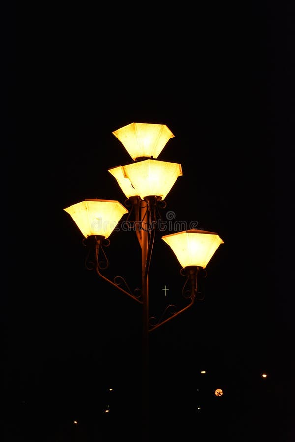 Golden Lights from a Lamp Post. Stock Image - Image of energy, late ...