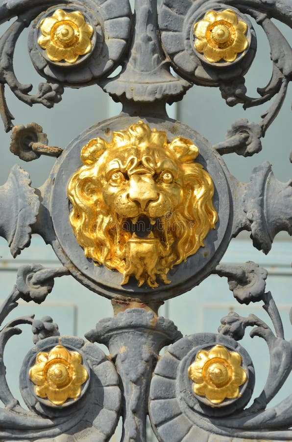 A Golden Lion on a Wrought-iron Gate. Stock Photo - Image of details ...