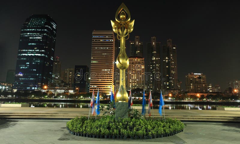 Golden Lotus Statue Against Modern Buildings Editorial Image - Image of ...