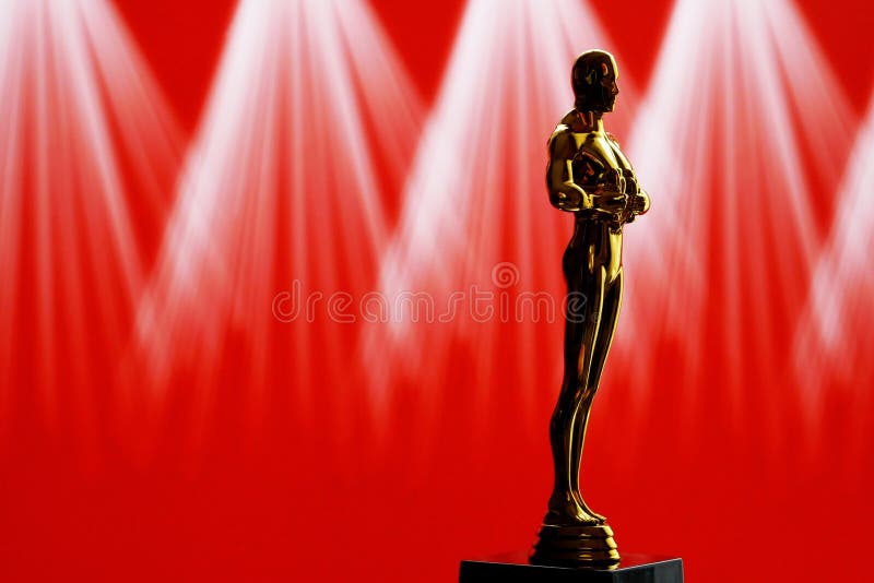 Hollywood Golden Oscar Academy Award Statue in Hand Isolated on White ...