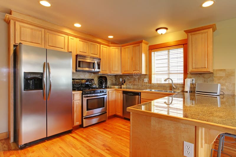 Golden Maple Beautiful Cabinets Kitchen. Stock Image - Image of real ...