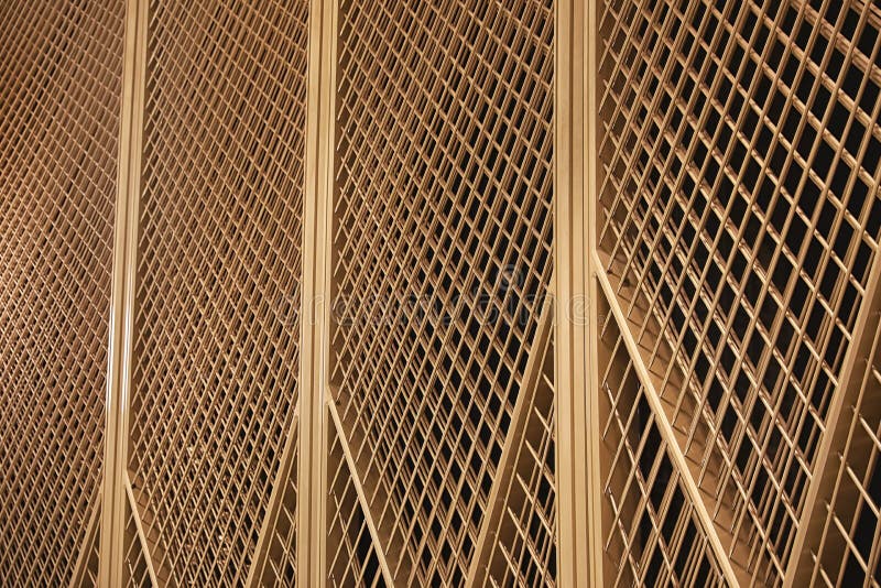 Golden Metal Construction on Dark Background. Stock Image - Image of ...