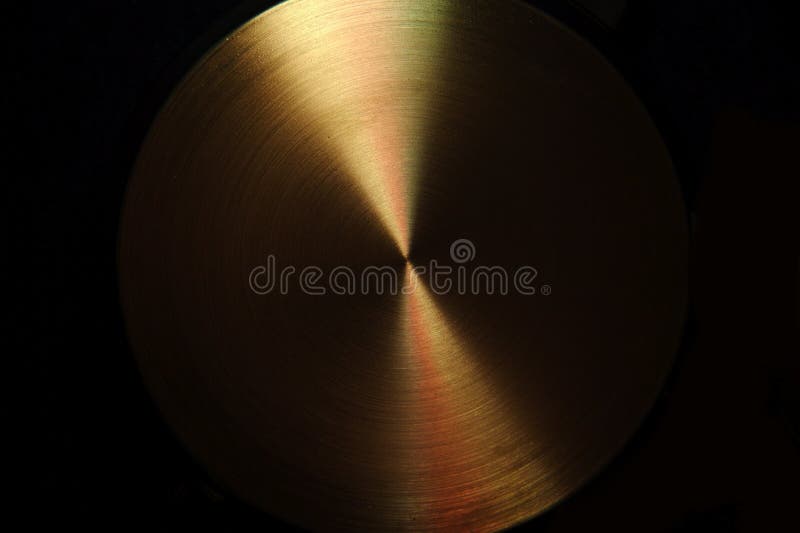Golden metal disc stock image. Image of macro, background - 4175579