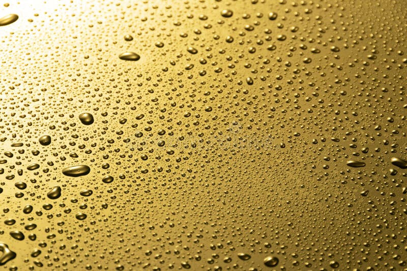 Golden Metal Water Drops on Shiny Metallic Surface Stock Photo - Image ...