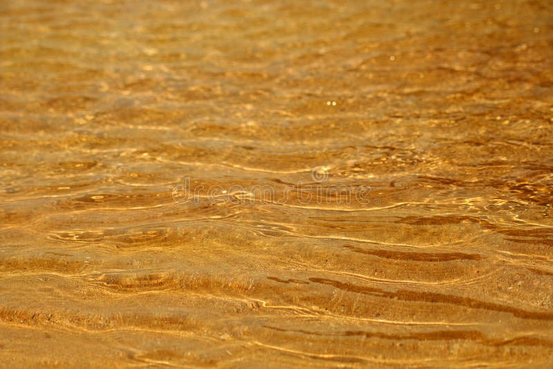 Golden ocean water stock photo. Image of crystal, waves - 3188326