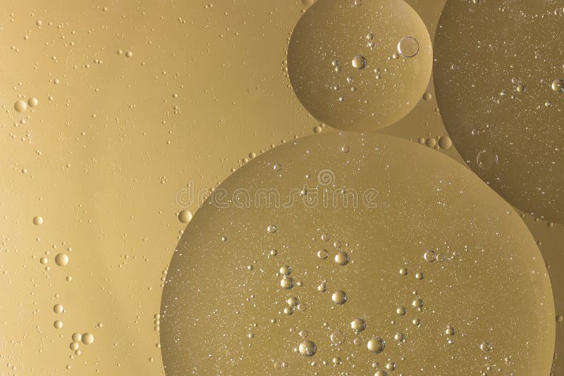 Golden oil drops abstract stock photo. Image of design - 75444338