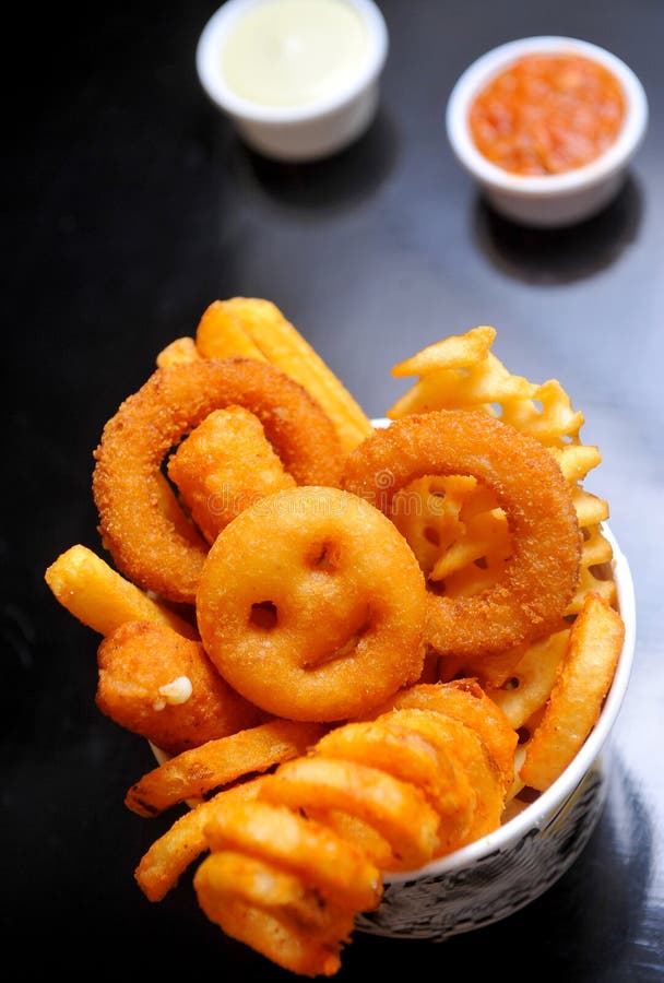 Golden onion rings stock photo. Image of battered, meal - 20031334