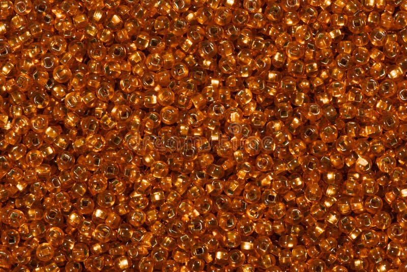 Golden Orange Seed Beads for Background or Texture. Stock Image - Image ...