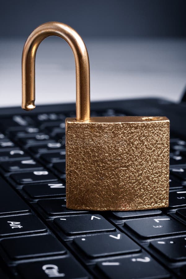 Golden Padlock on Computer Keyboard Stock Photo - Image of computer ...
