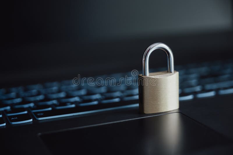 A Golden Padlock Placed on Laptop Computer Keyboard Stock Image - Image ...